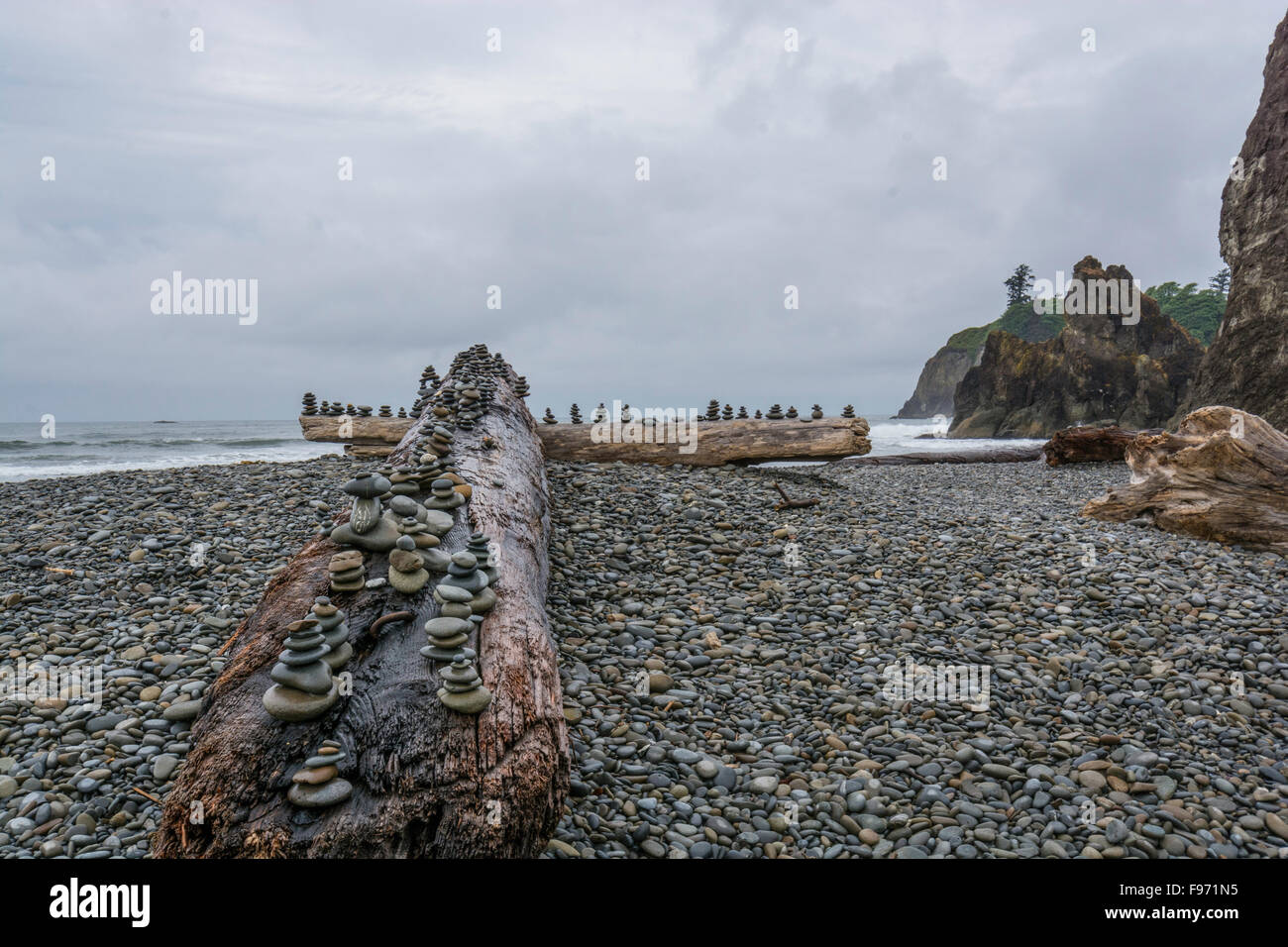 Stacks of Rocks placed on logs at Ruby Beach Olympic Penisula Wash USA ...