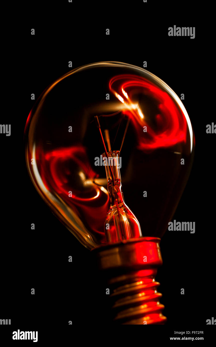 Light bulb in redlight Stock Photo - Alamy