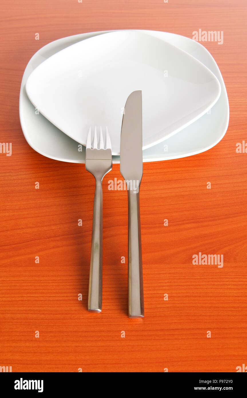 Set of utensils arranged on the table Stock Photo - Alamy