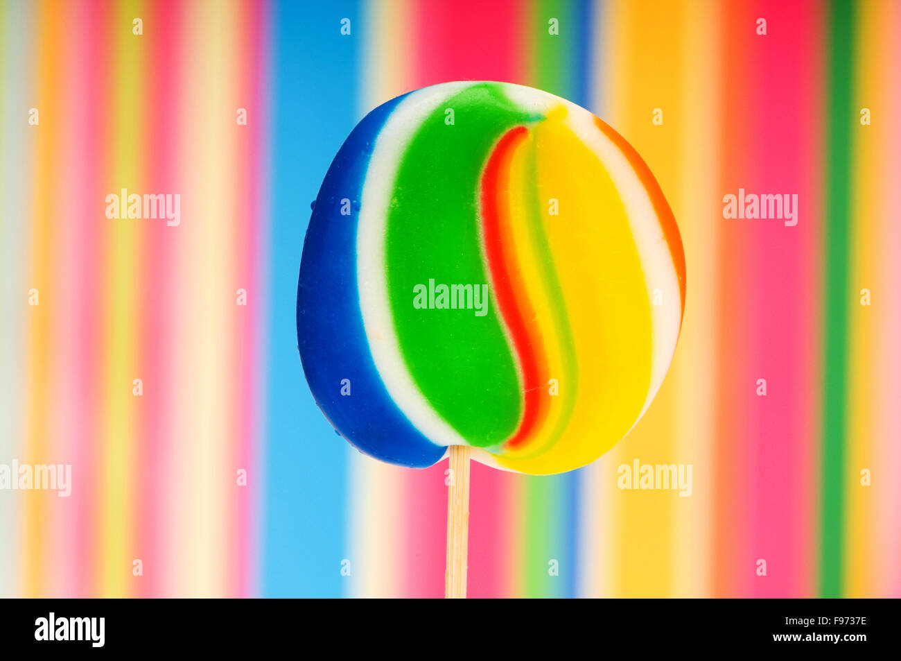 Colourful lollipop against the colourful background Stock Photo - Alamy