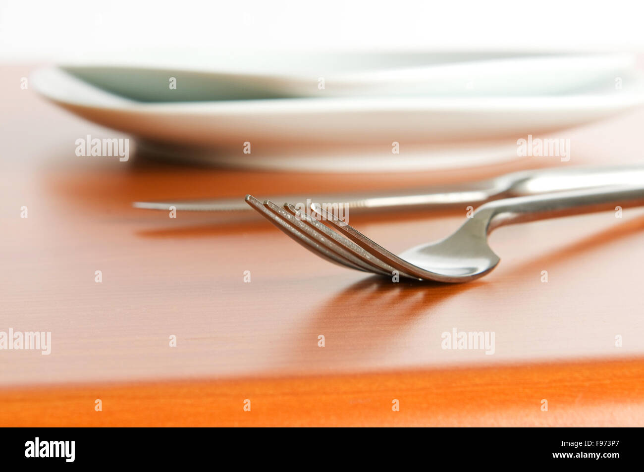 Set of utensils arranged on the table Stock Photo - Alamy