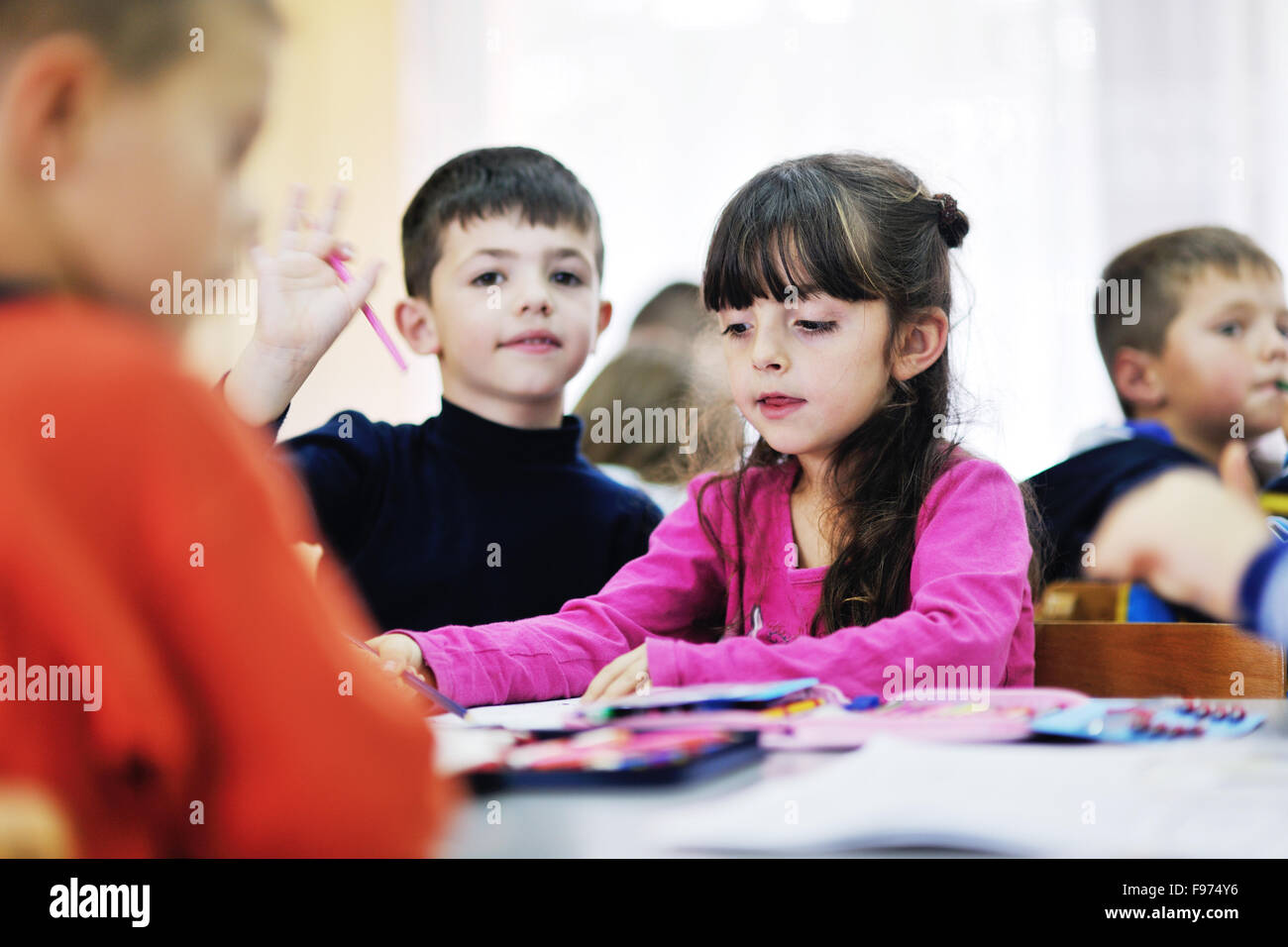 happy child kids group have fun and play at kindergarden indoor ...