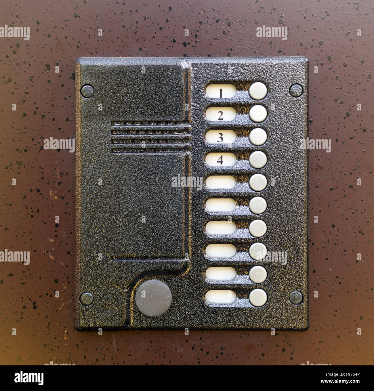 Close-up of building intercom in steel door Stock Photo - Alamy