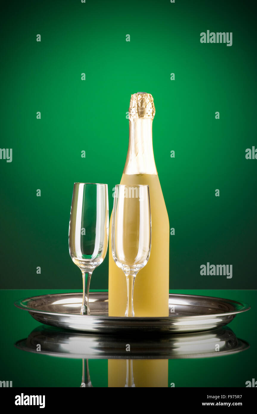 Champagne against color gradient background Stock Photo - Alamy