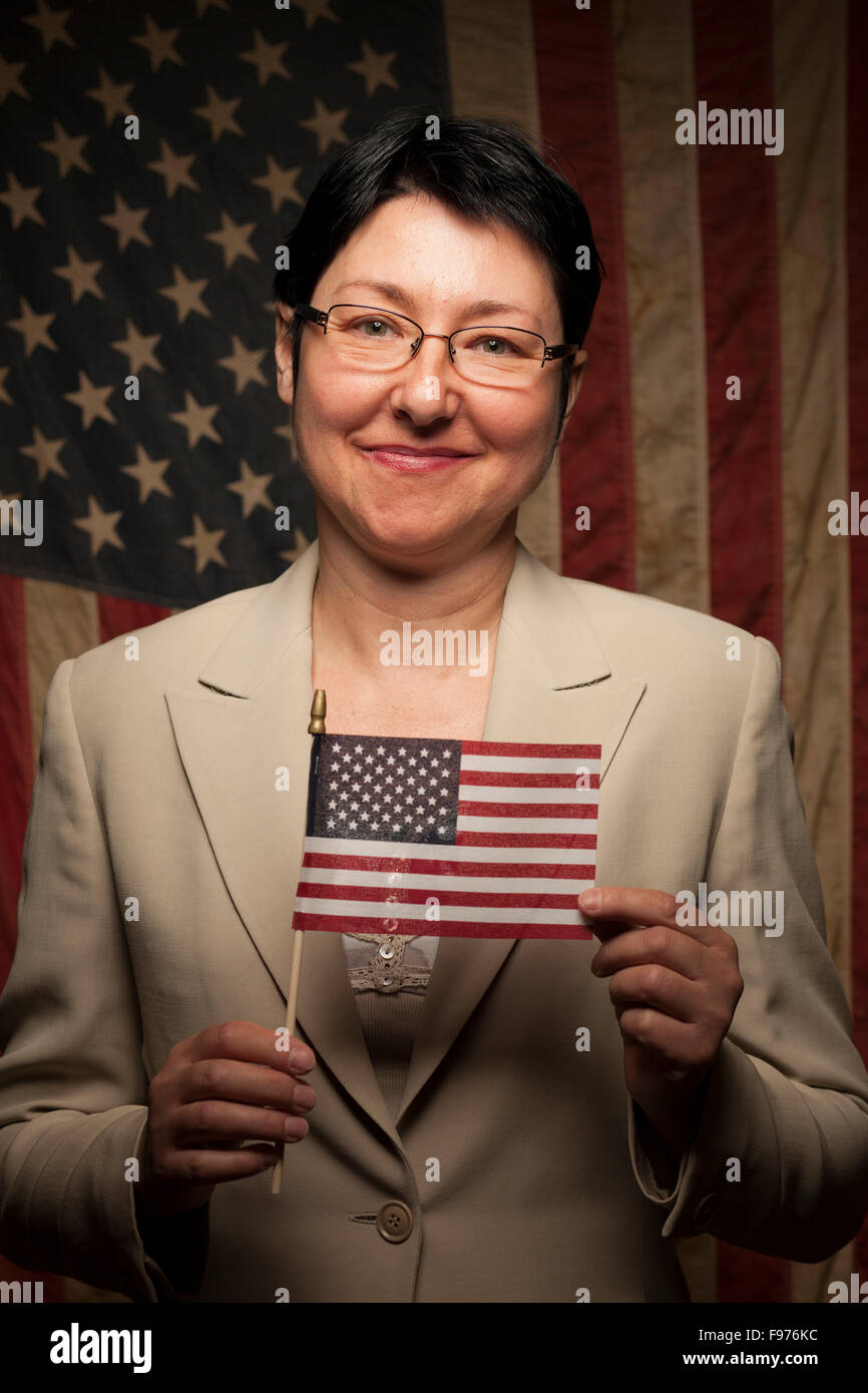 A woman poses for a portrait as a first time voter in the November 2012 ...