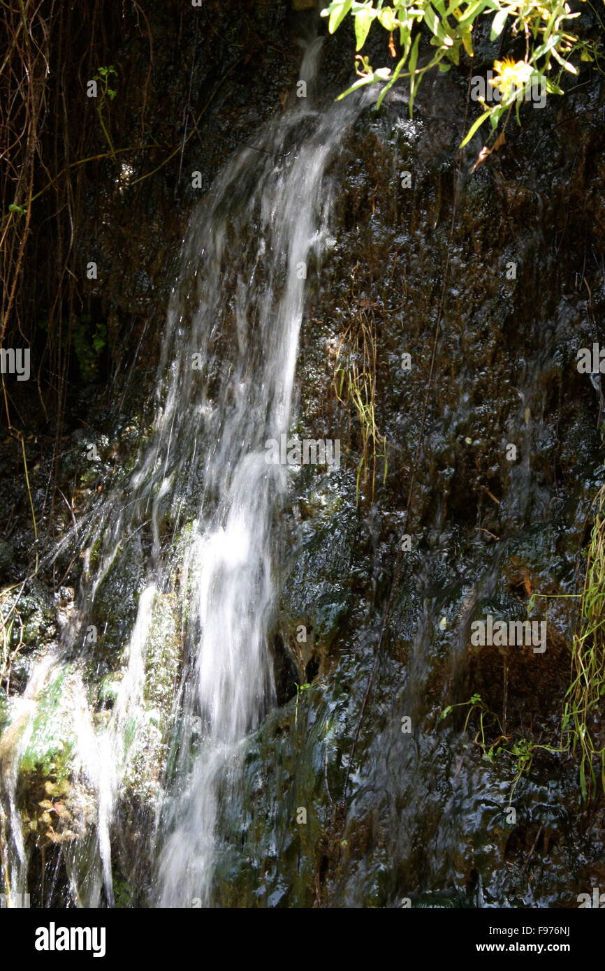 View Of Waterfall Along Rocks Stock Photo - Alamy