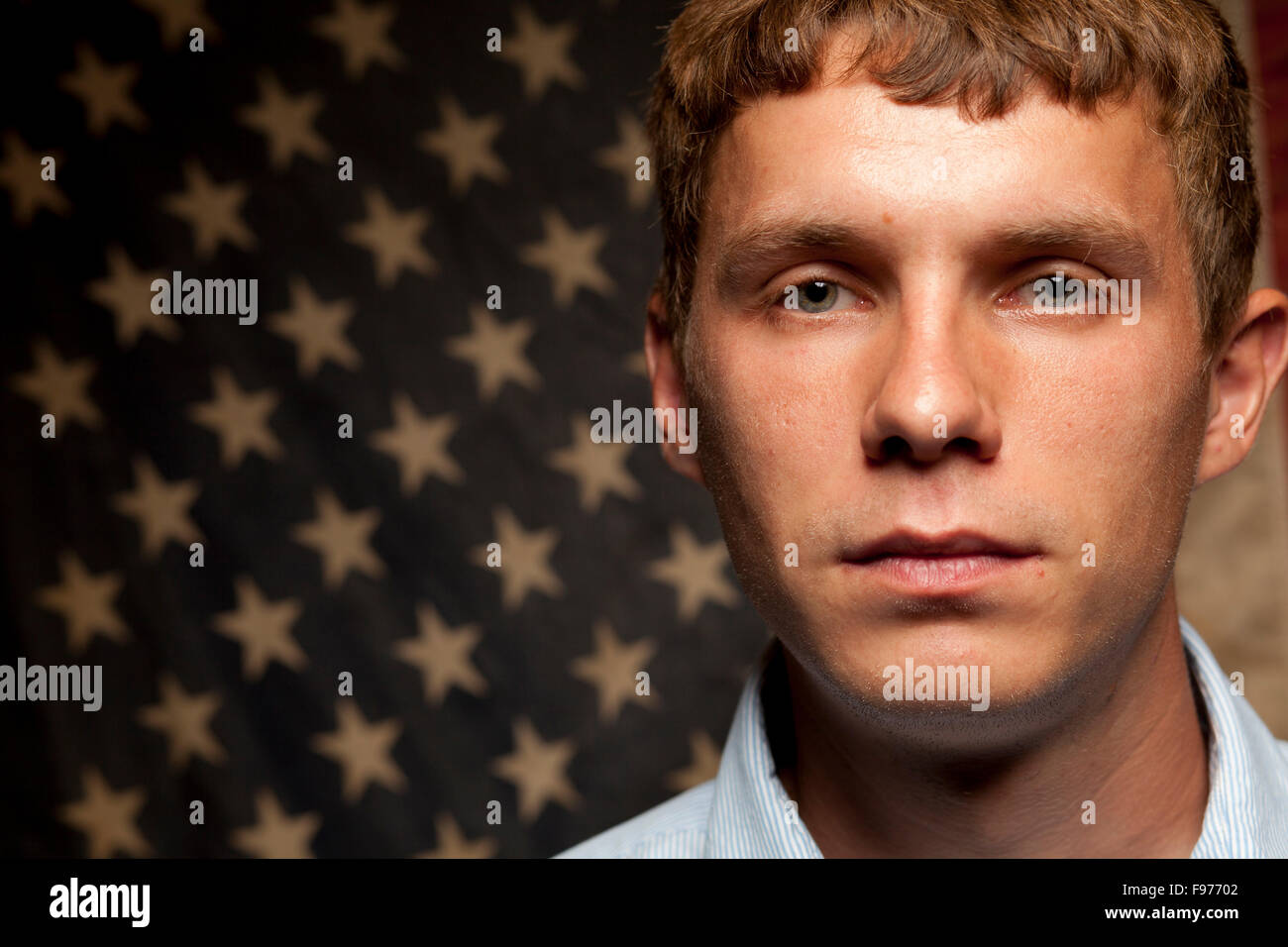 A man poses for a portrait as a first time voter in the November 2012 ...