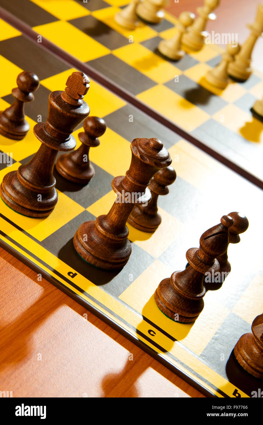 Set of chess figures on the playing board Stock Photo - Alamy