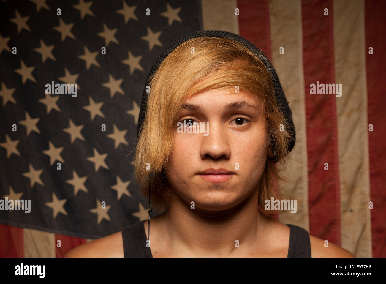 A man poses for a portrait as a first time voter in the November 2012 ...