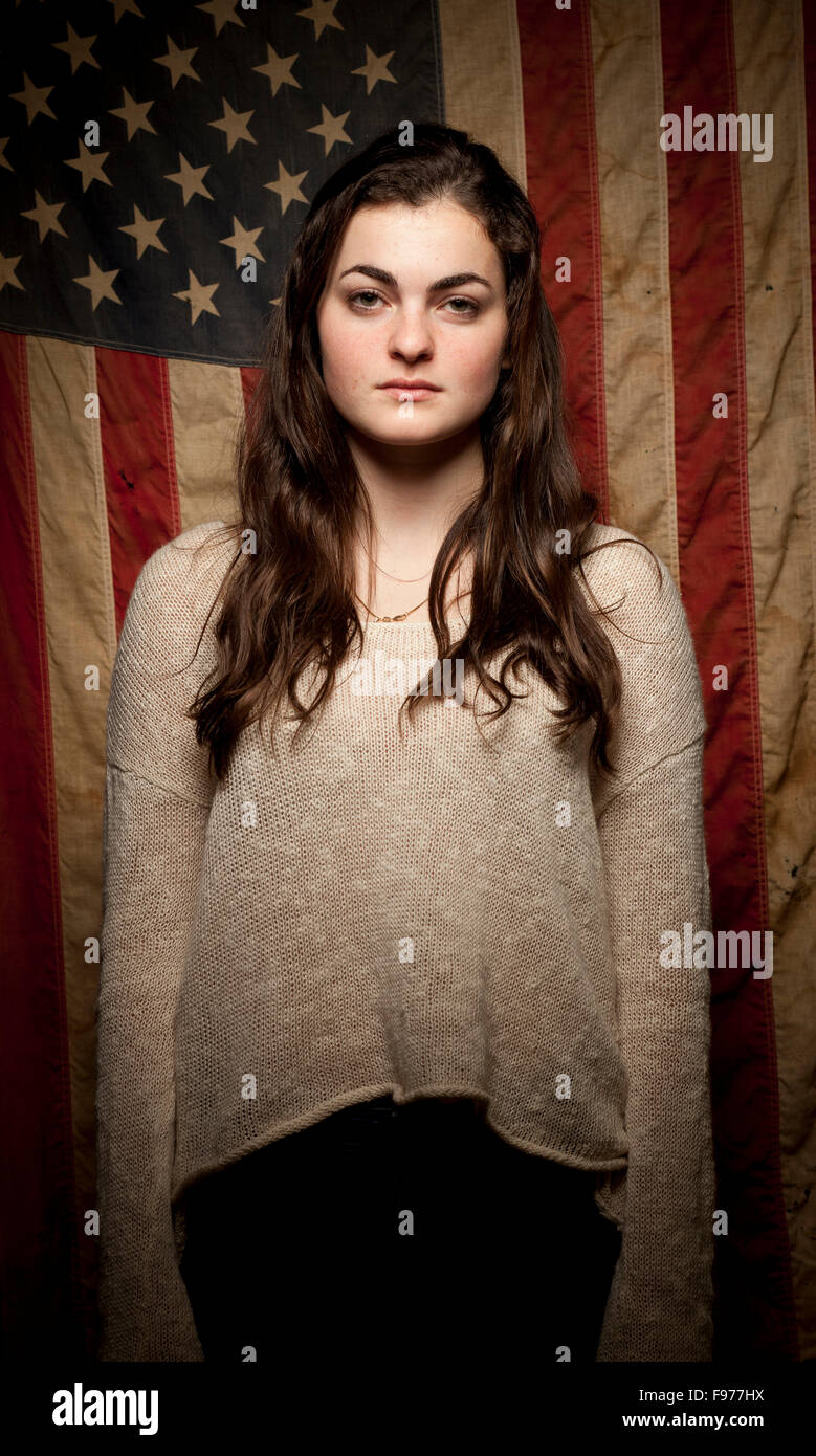 A woman poses for a portrait as a first time voter in the November 2012 ...