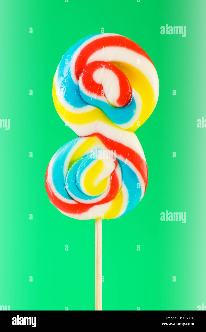 Colourful lollipop against the colourful background Stock Photo - Alamy