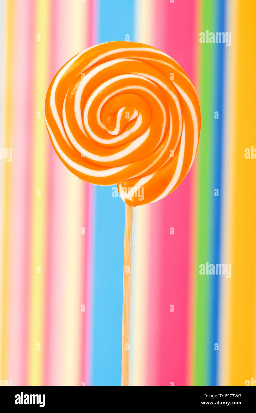 Colourful lollipop against the colourful background Stock Photo - Alamy