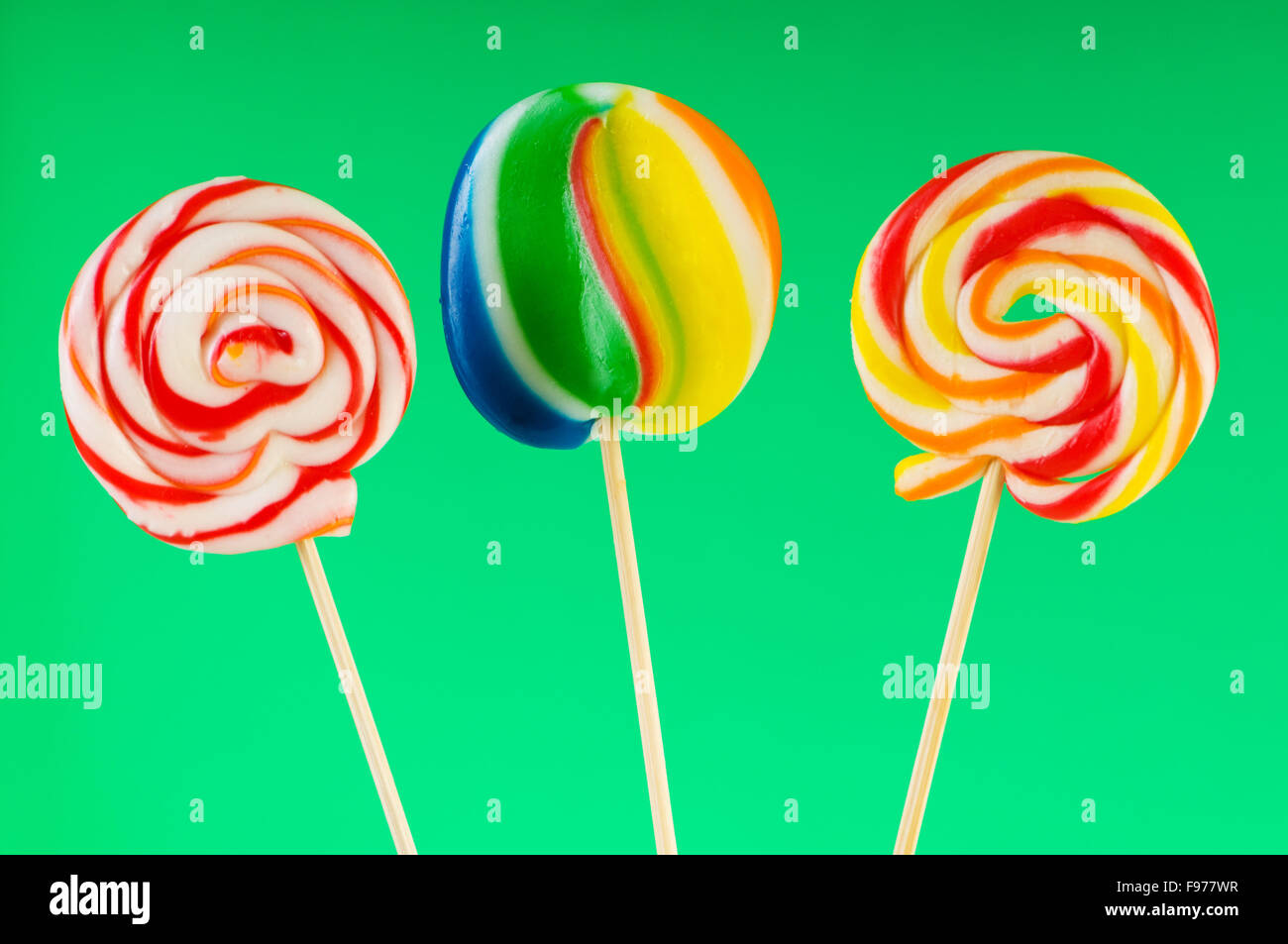 Colourful lollipop against the colourful background Stock Photo - Alamy