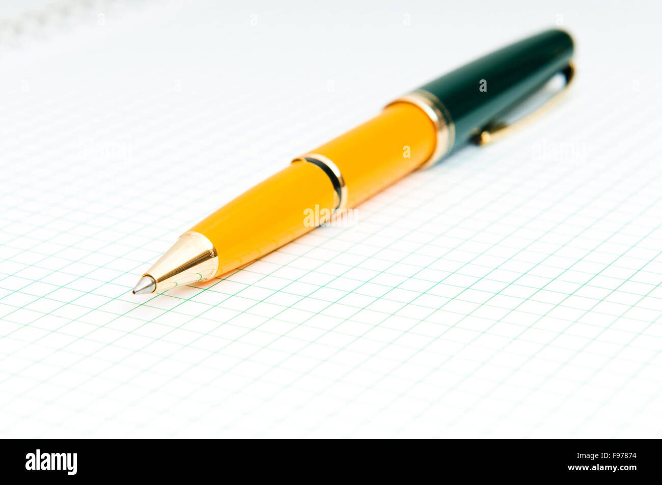 Writing pen on the blank page Stock Photo - Alamy