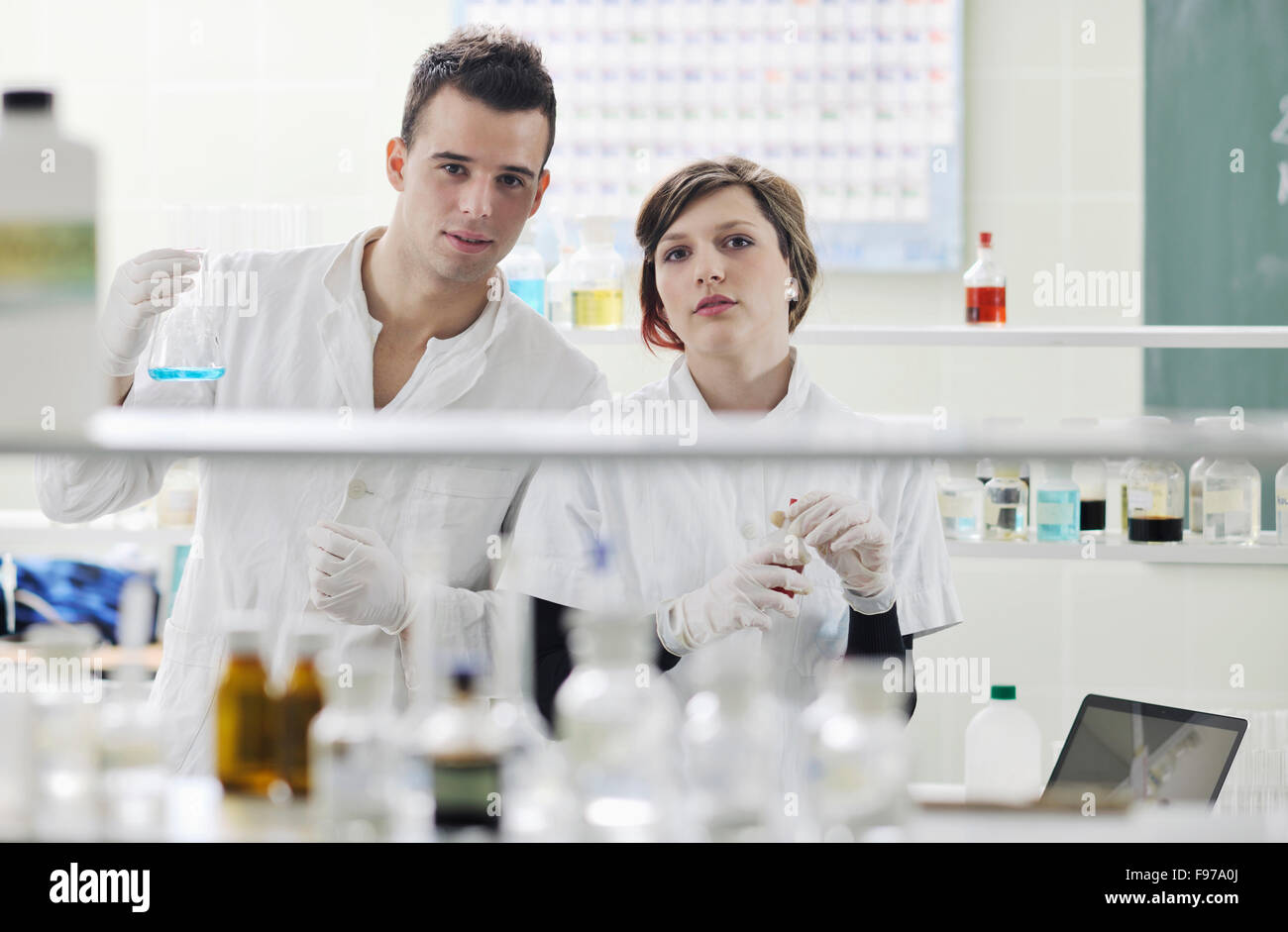 young students couple making test in bright labaratory Stock Photo - Alamy