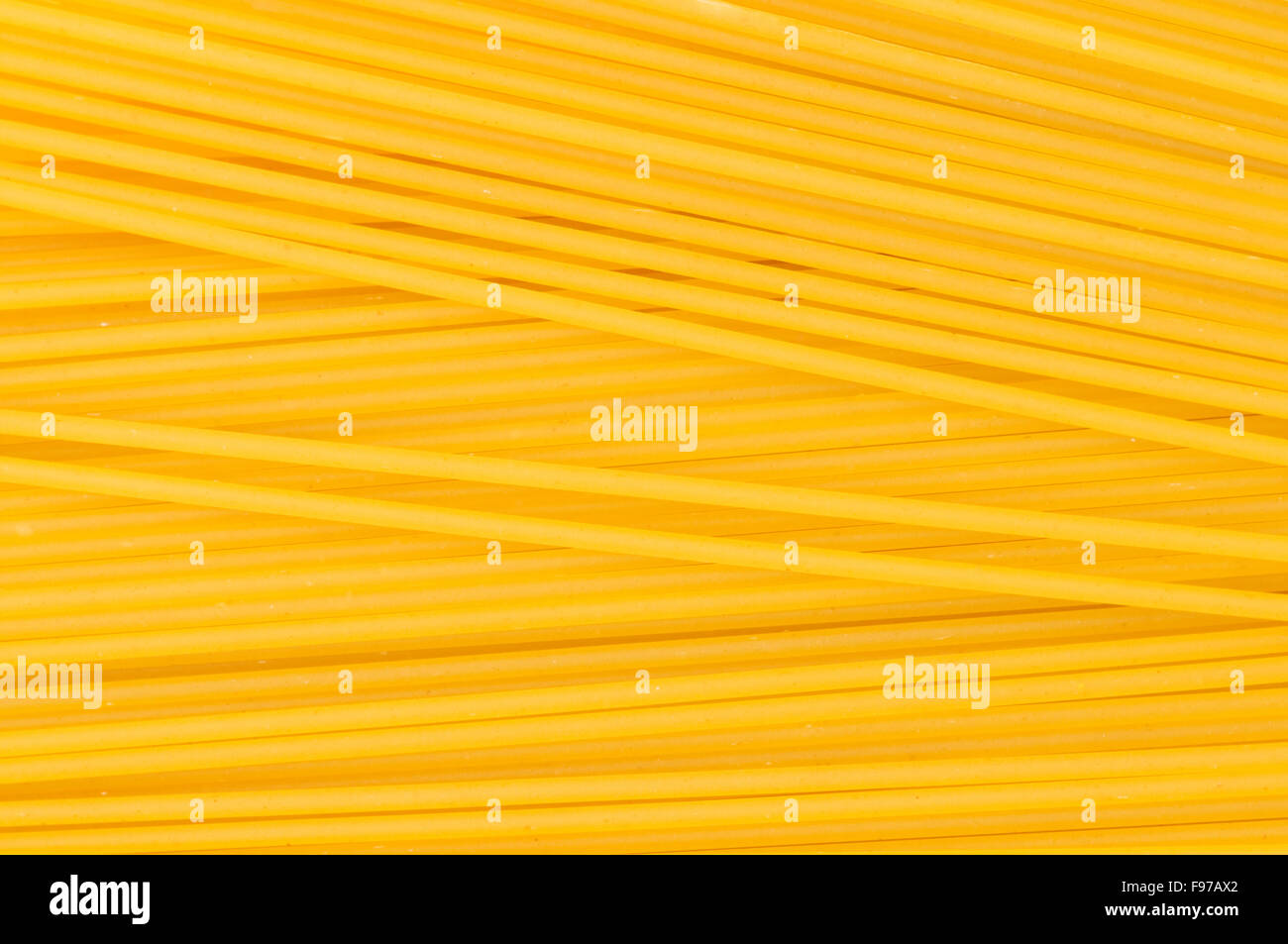 Extreme close up of yellow spaghetti background Stock Photo - Alamy