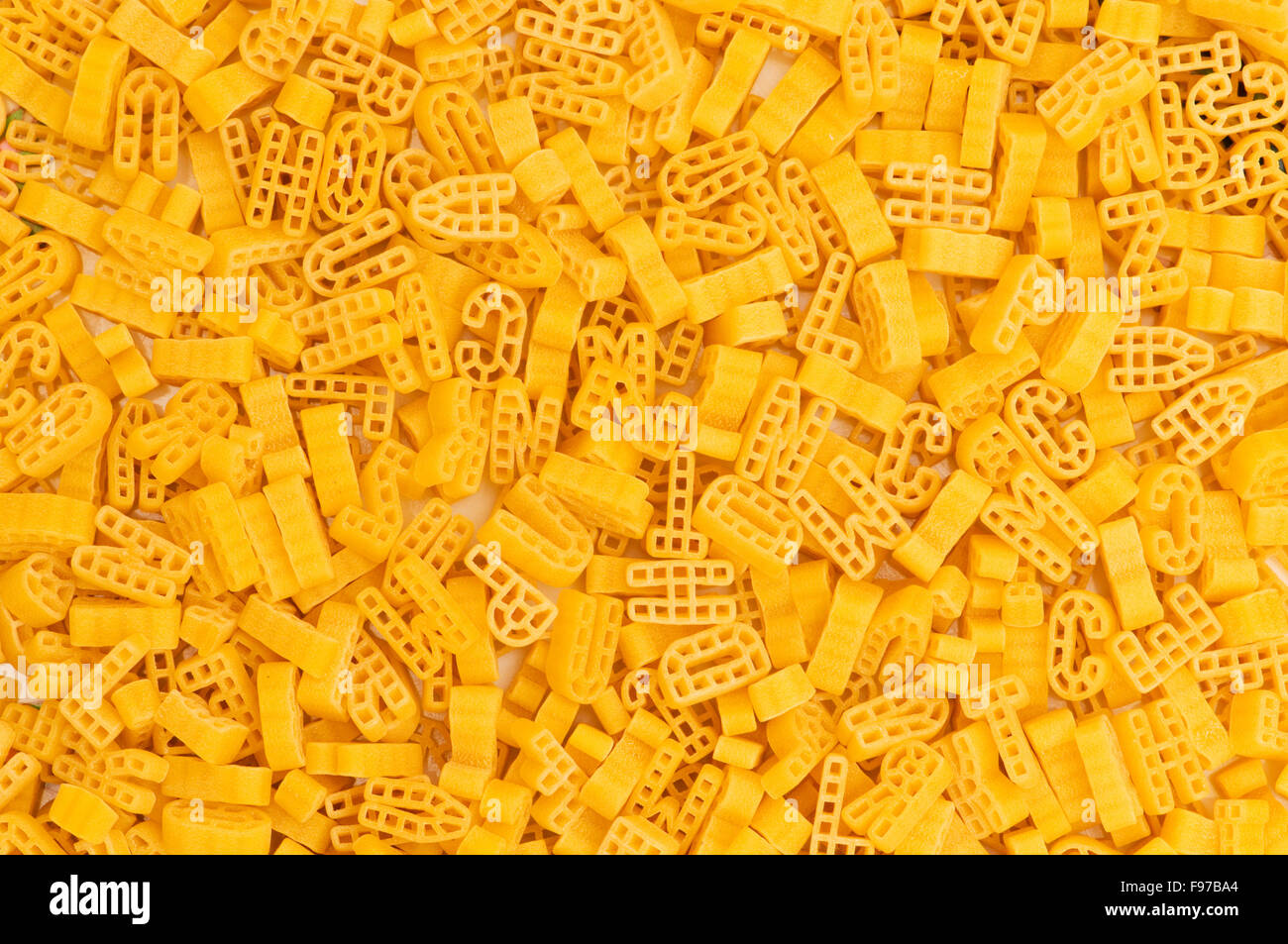 Close up of italian pasta - alphabet shaped Stock Photo - Alamy