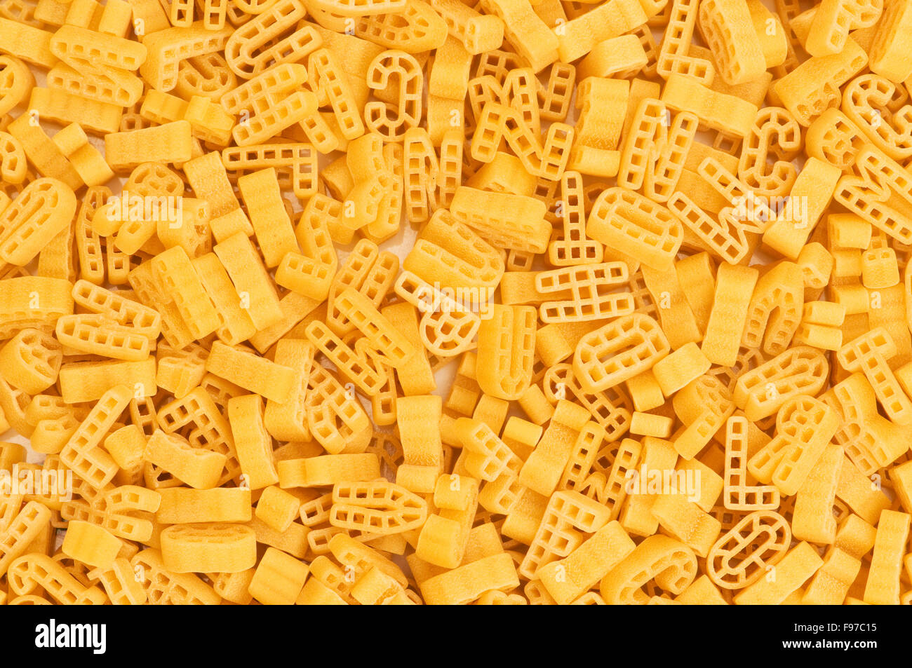 Close up of italian pasta - alphabet shaped Stock Photo - Alamy