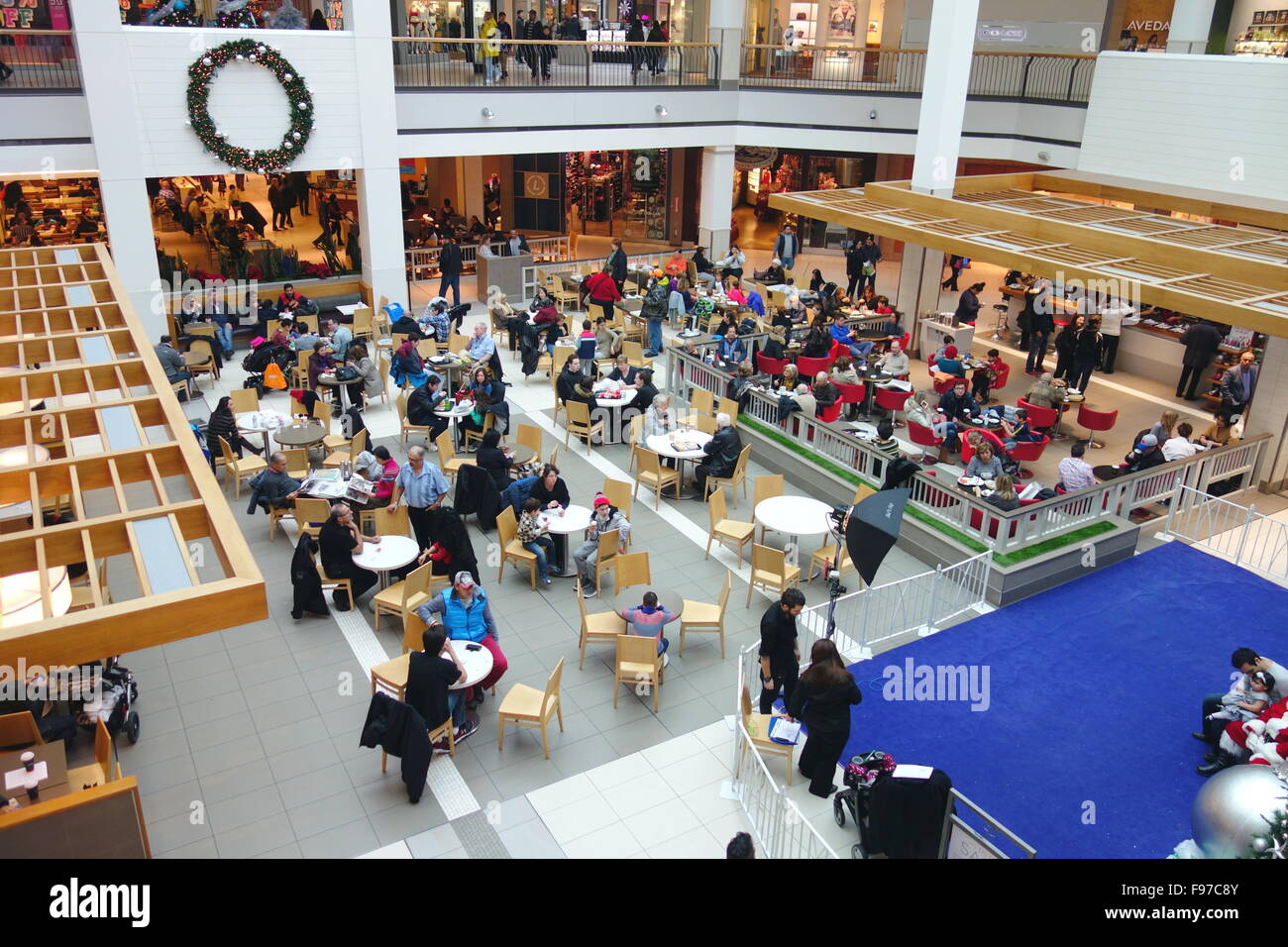 People sitting at tables at a mall food court in Toronto, Canada Stock ...