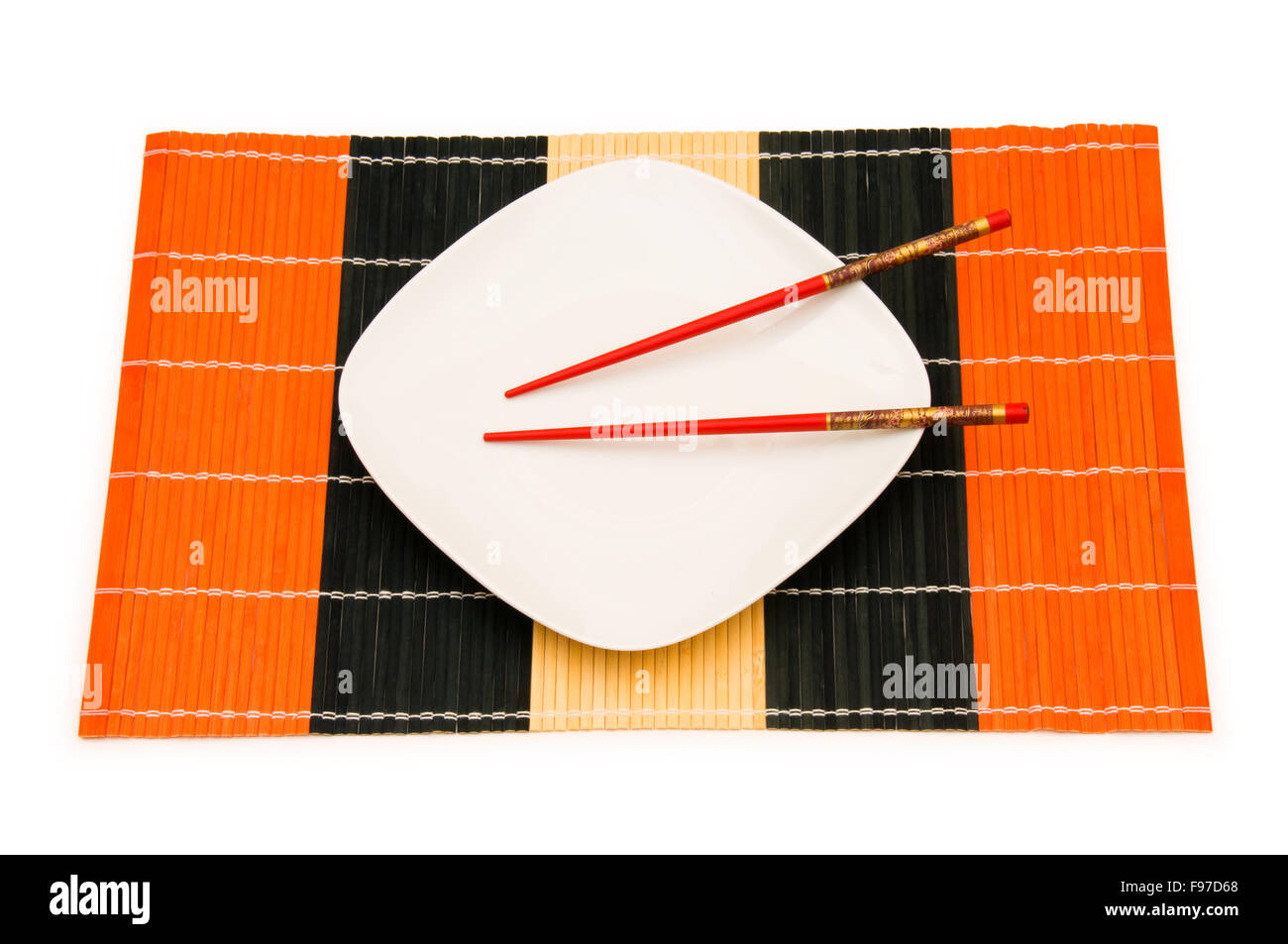 White plate with chopsticks isolated on white Stock Photo - Alamy