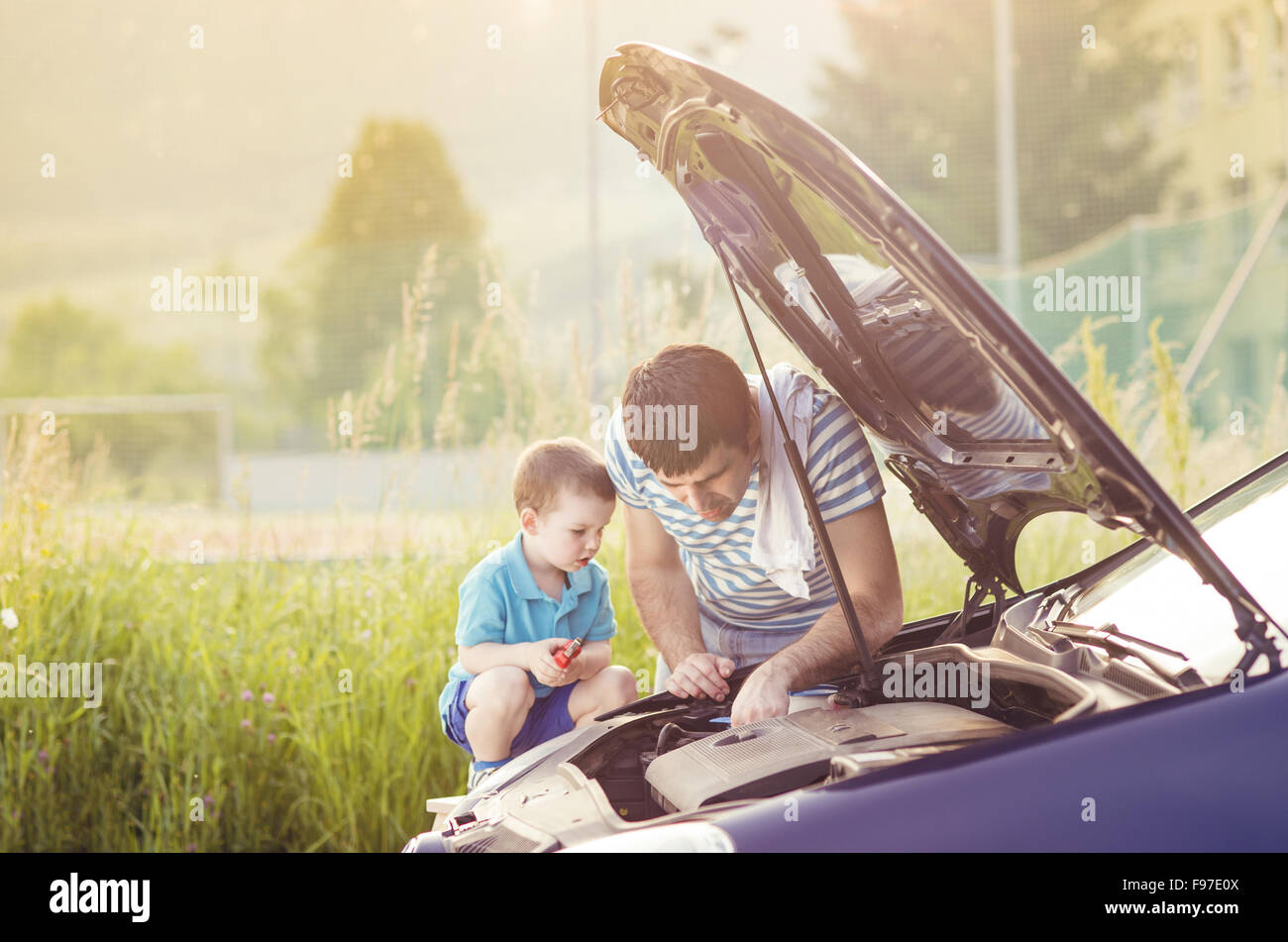 Father son car repair hi-res stock photography and images - Alamy