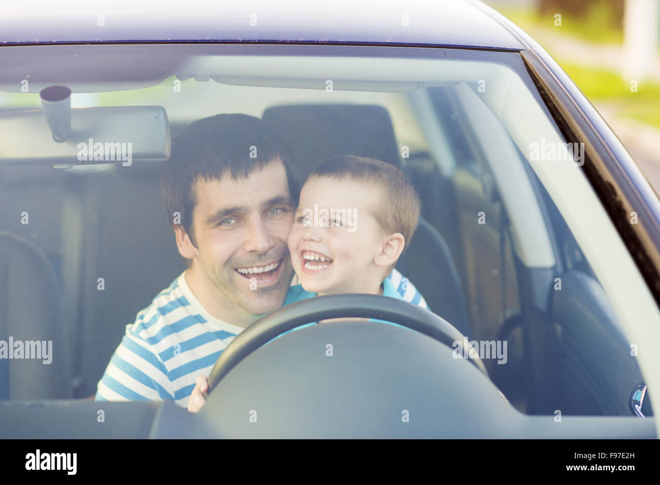Father teaching son to drive car hi-res stock photography and images ...