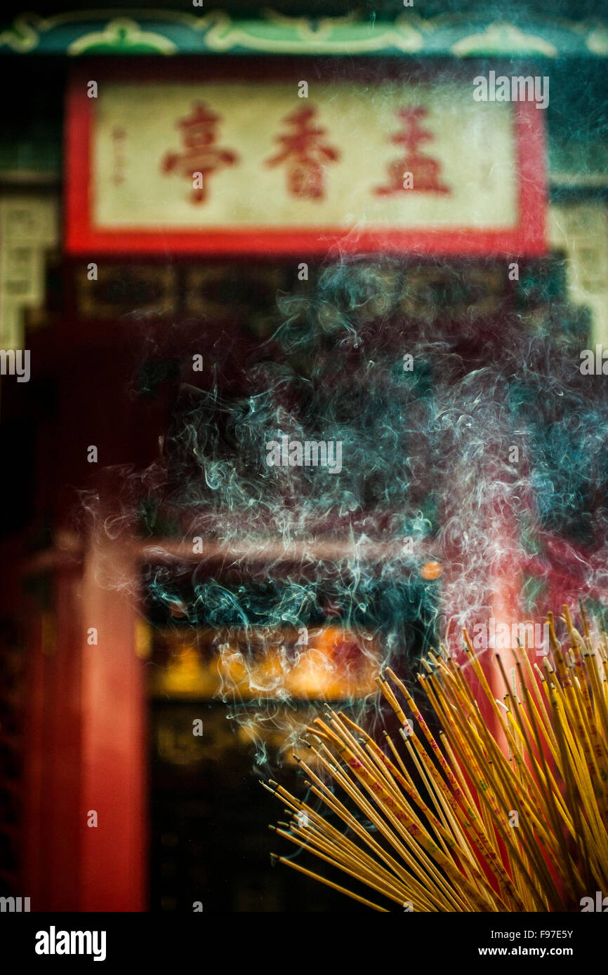 Smoke rising from a large bundle of burning incense Stock Photo - Alamy