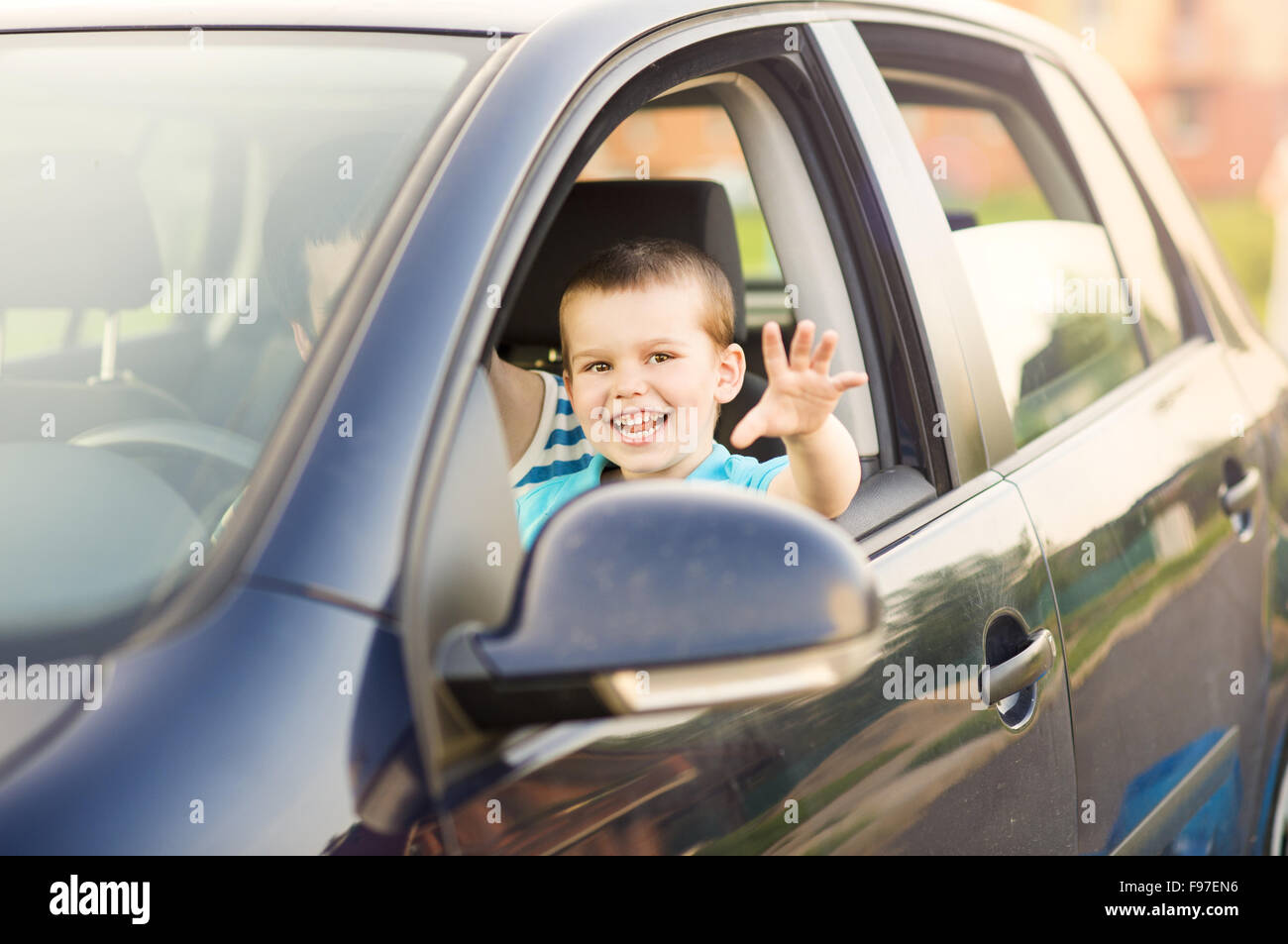 Father teaching son to drive car hi-res stock photography and images ...