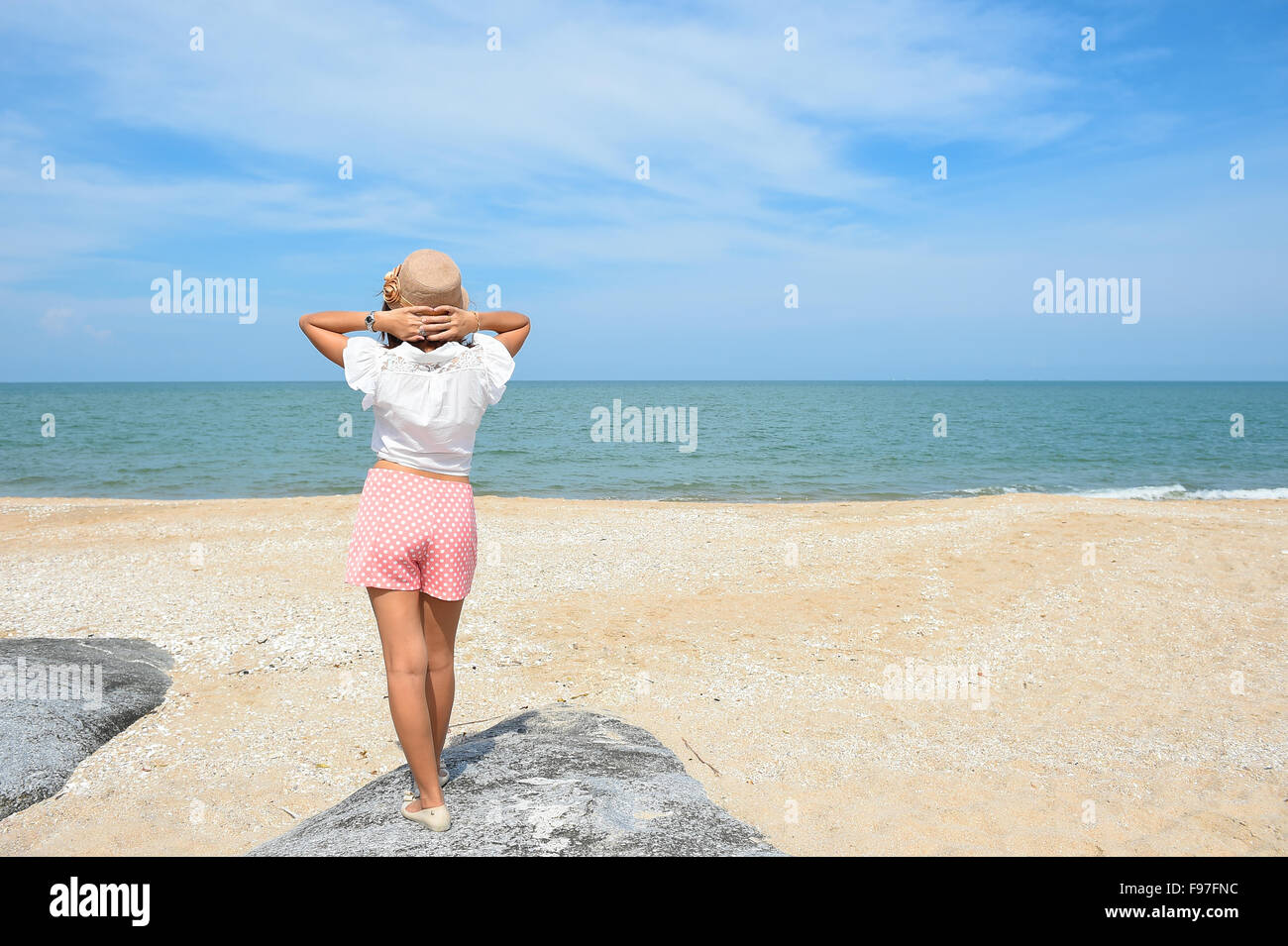 Woman behind beach hi-res stock photography and images - Alamy