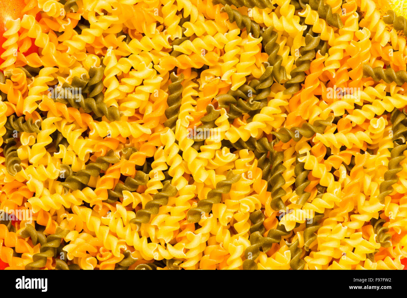 Close up of italian pasta - spiral shaped Stock Photo - Alamy