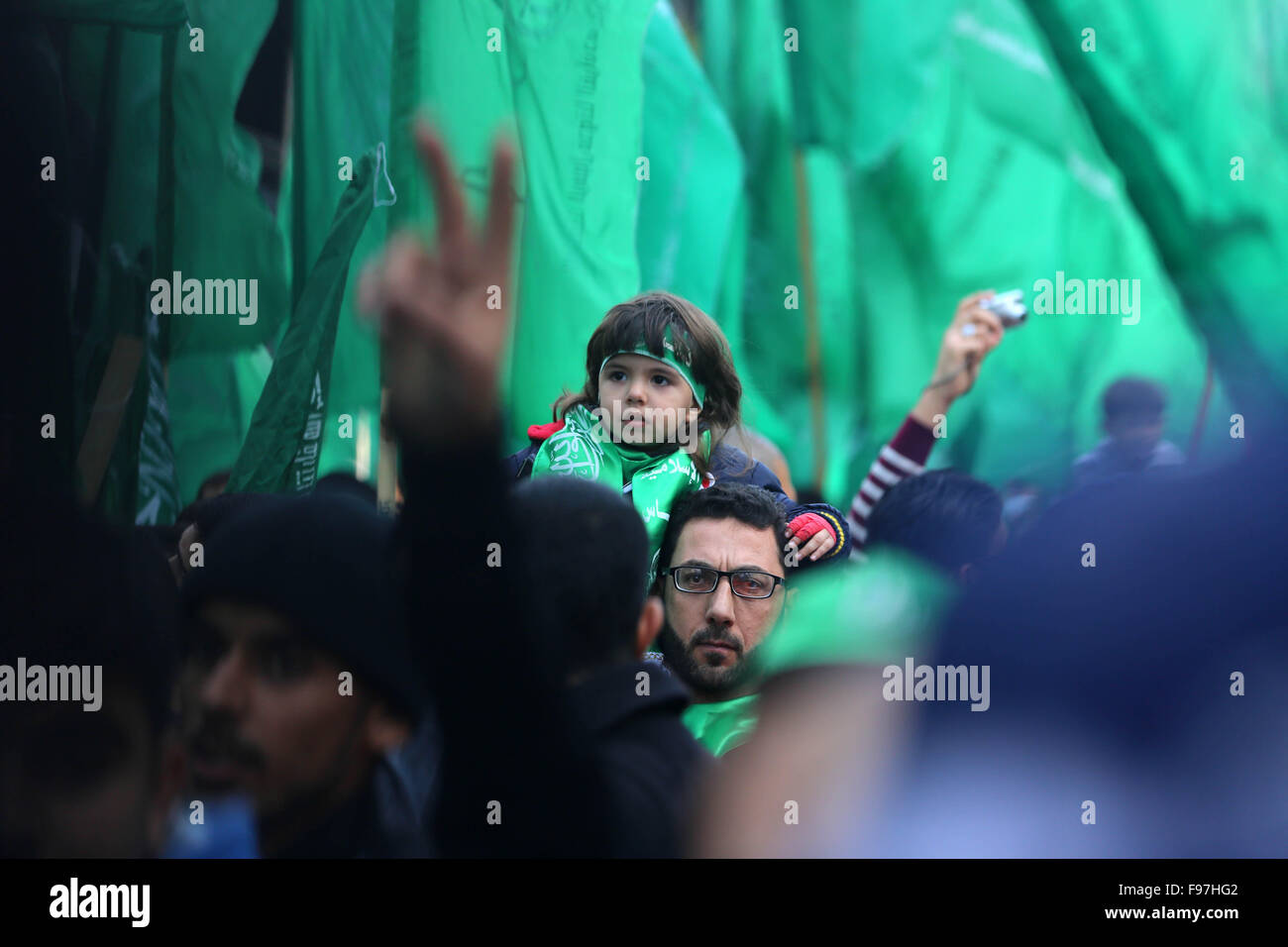 Gaza, Palestine. 14th Dec, 2015. A Palestinian child on his father's ...