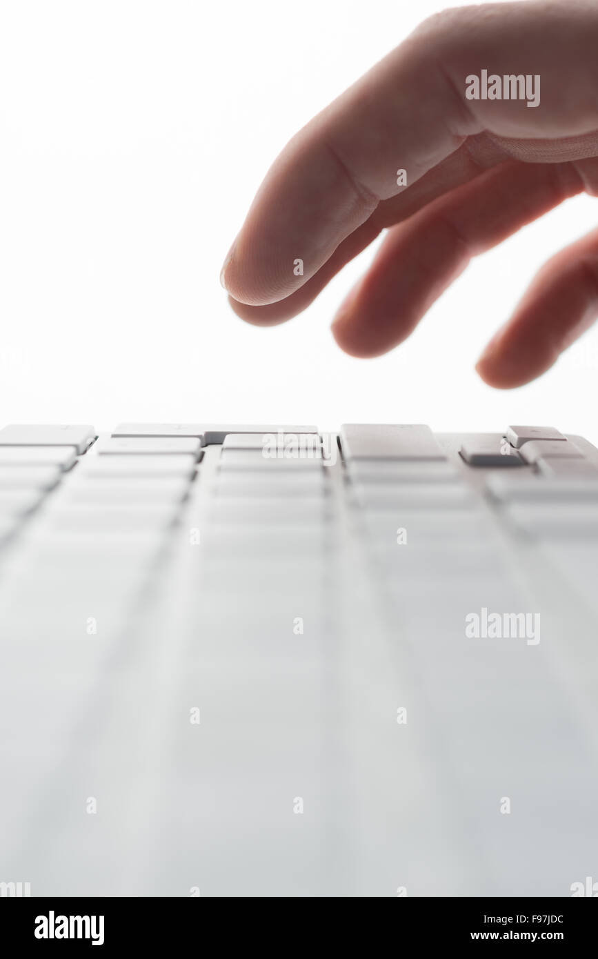 Finger tap the Enter key of a keyboard Stock Photo - Alamy
