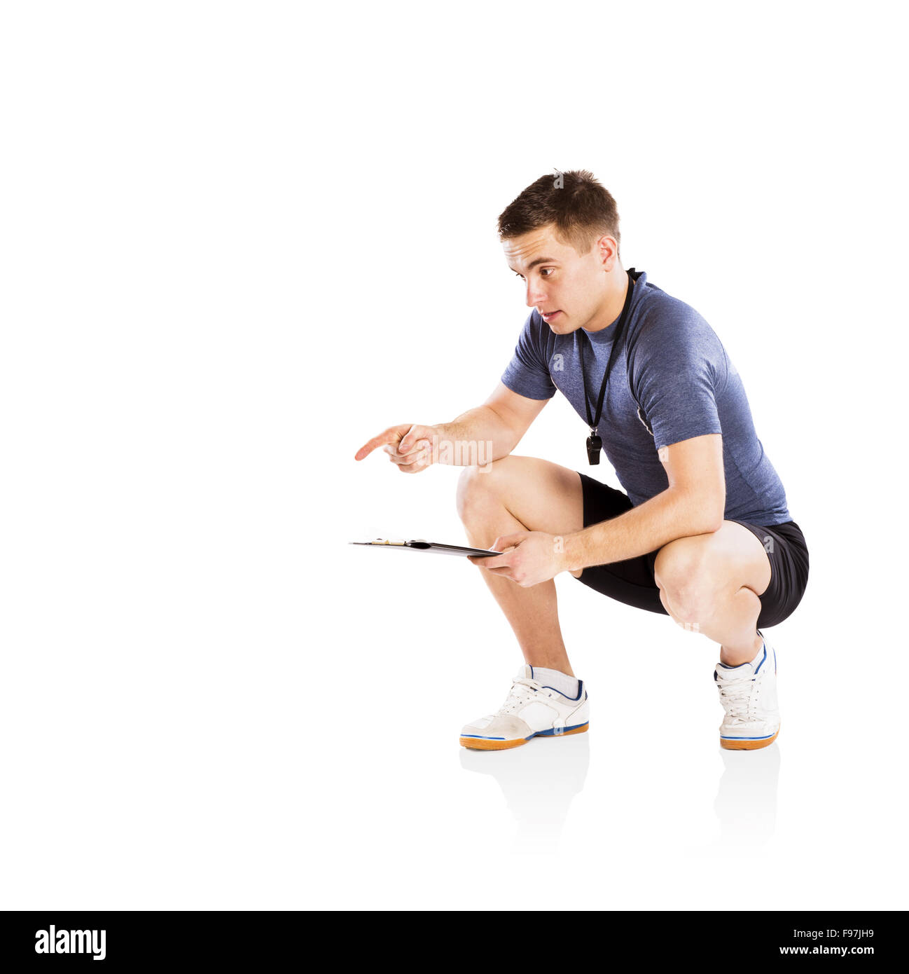 Professional fitness coach isolated on white background Stock Photo - Alamy