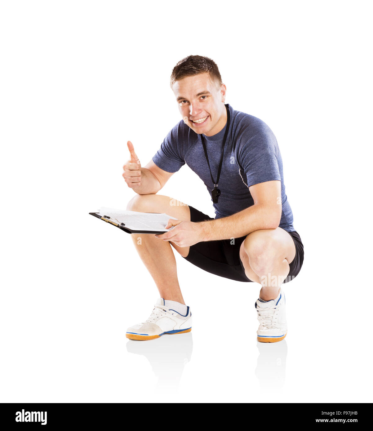 Professional fitness coach isolated on white background Stock Photo - Alamy