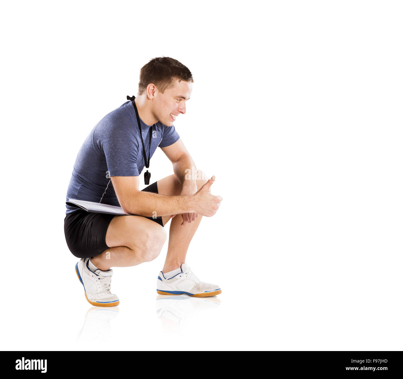 Professional fitness coach isolated on white background Stock Photo - Alamy