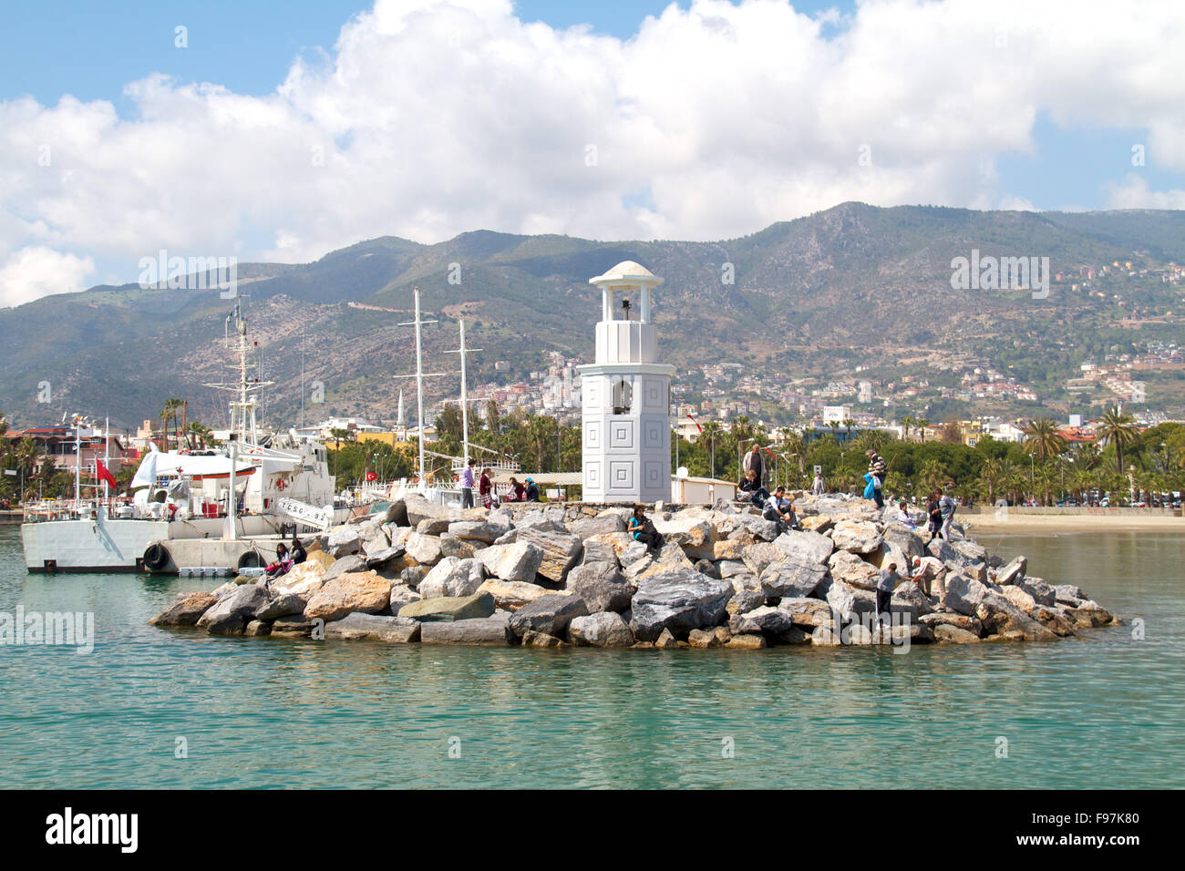 Lighthouse in port. Turkey, Alanya. Sunny weather Stock Photo - Alamy