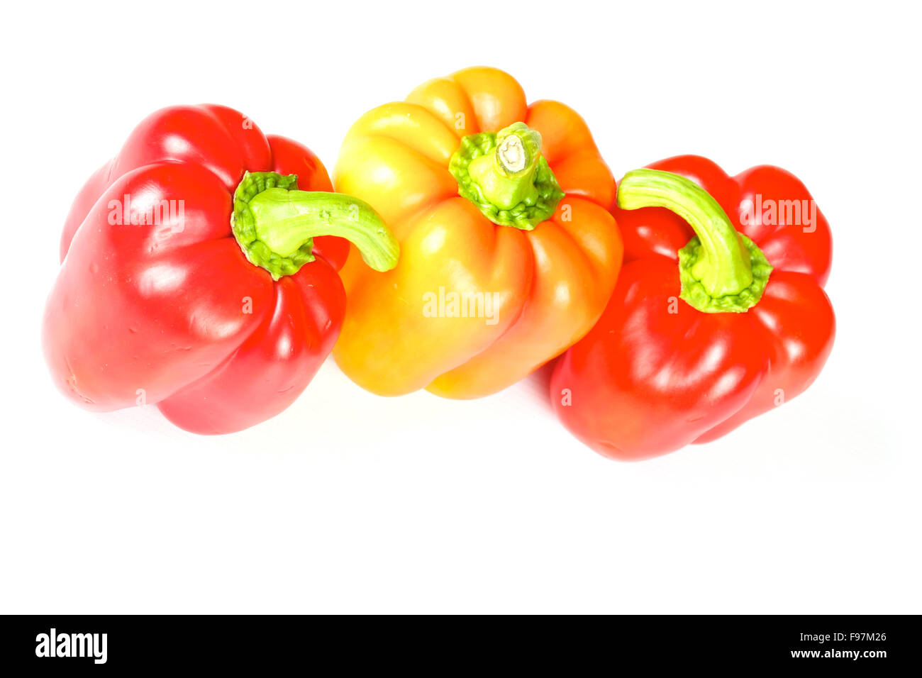 Orange and red pepper isolated on white background Stock Photo - Alamy