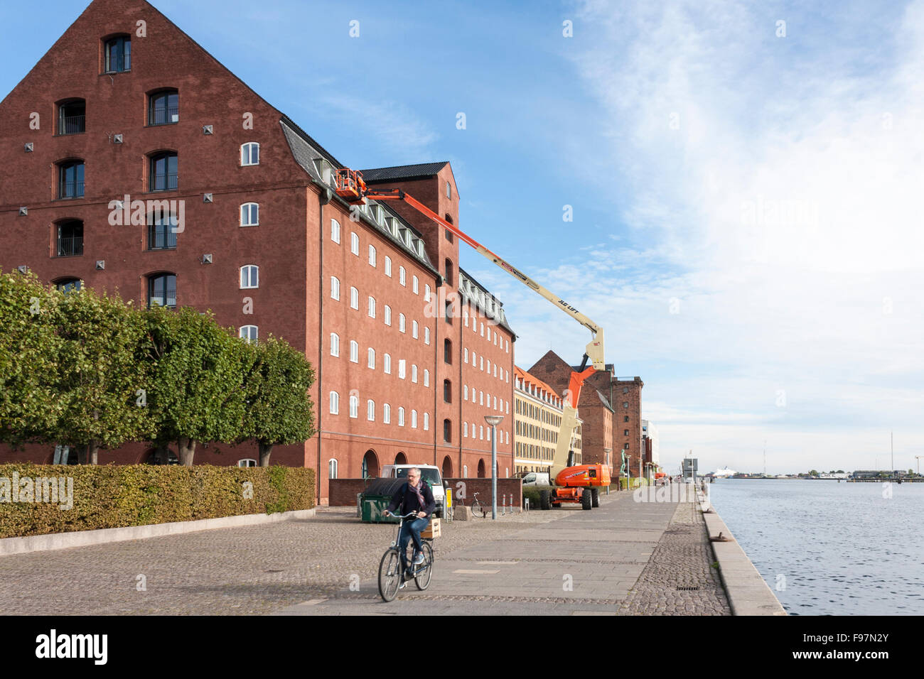 Articulated boom lift in use on waterfront. Copenhagen, Denmark, Europe ...