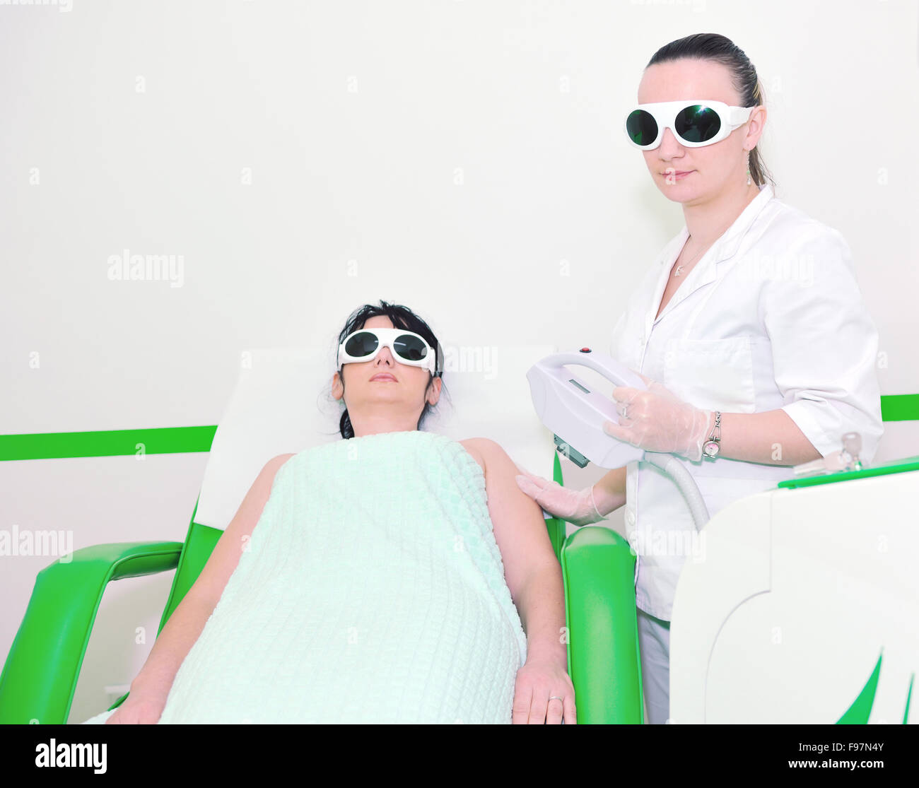 laser depilation and skincare treatment in spa and beauty studio Stock ...