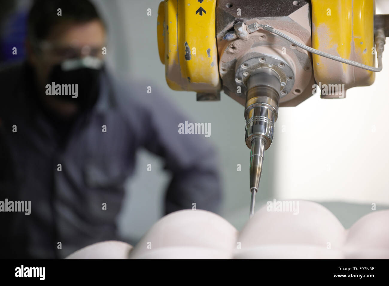 worker and multi axis machine Stock Photo - Alamy