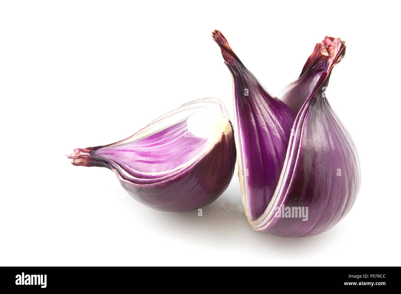 Cut red onion isolated on white background Stock Photo - Alamy