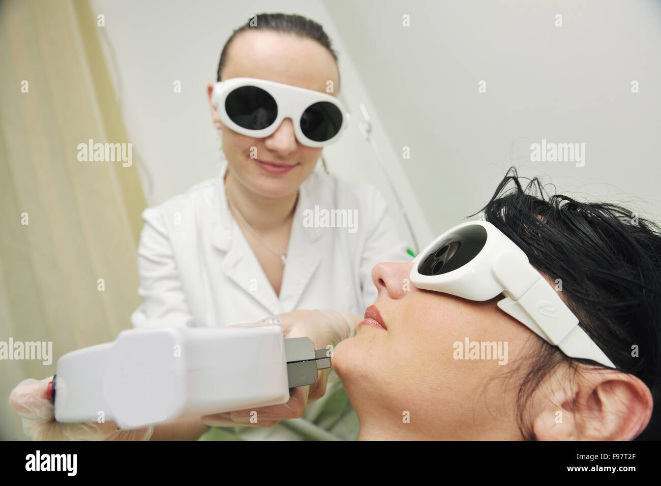 laser depilation and skincare treatment in spa and beauty studio Stock ...