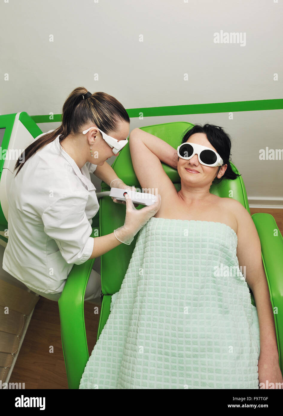 laser depilation and skincare treatment in spa and beauty studio Stock ...