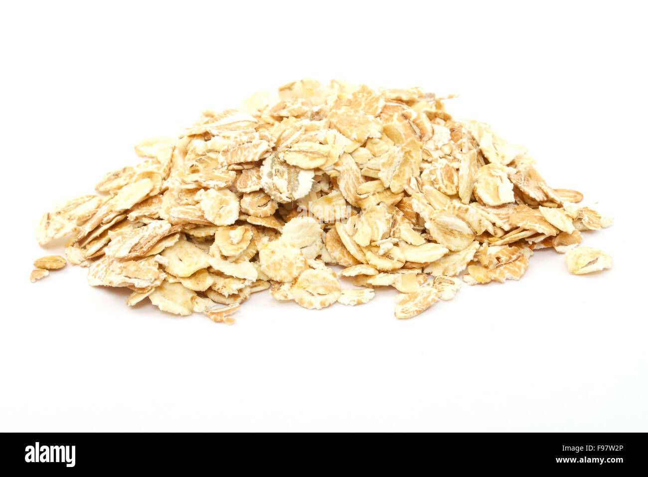 Heap of dry rolled oats isolated on white background Stock Photo - Alamy
