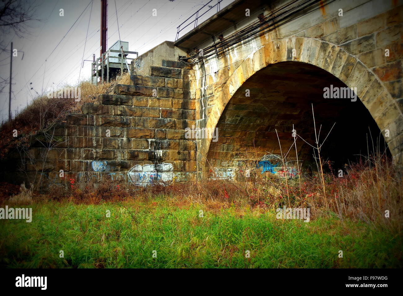 Graffiti on train bridge Stock Photo - Alamy