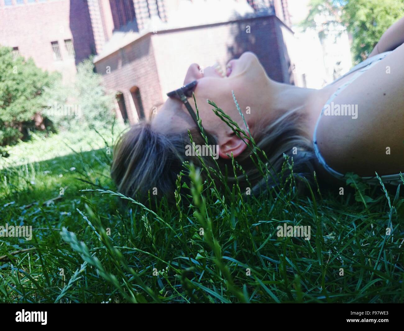 Woman lying on her side hi-res stock photography and images - Alamy