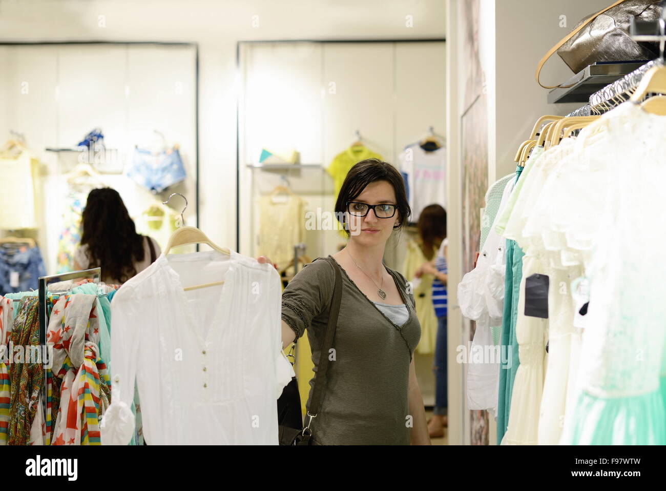 young woman in fashion store buy and shopping clothing Stock Photo - Alamy