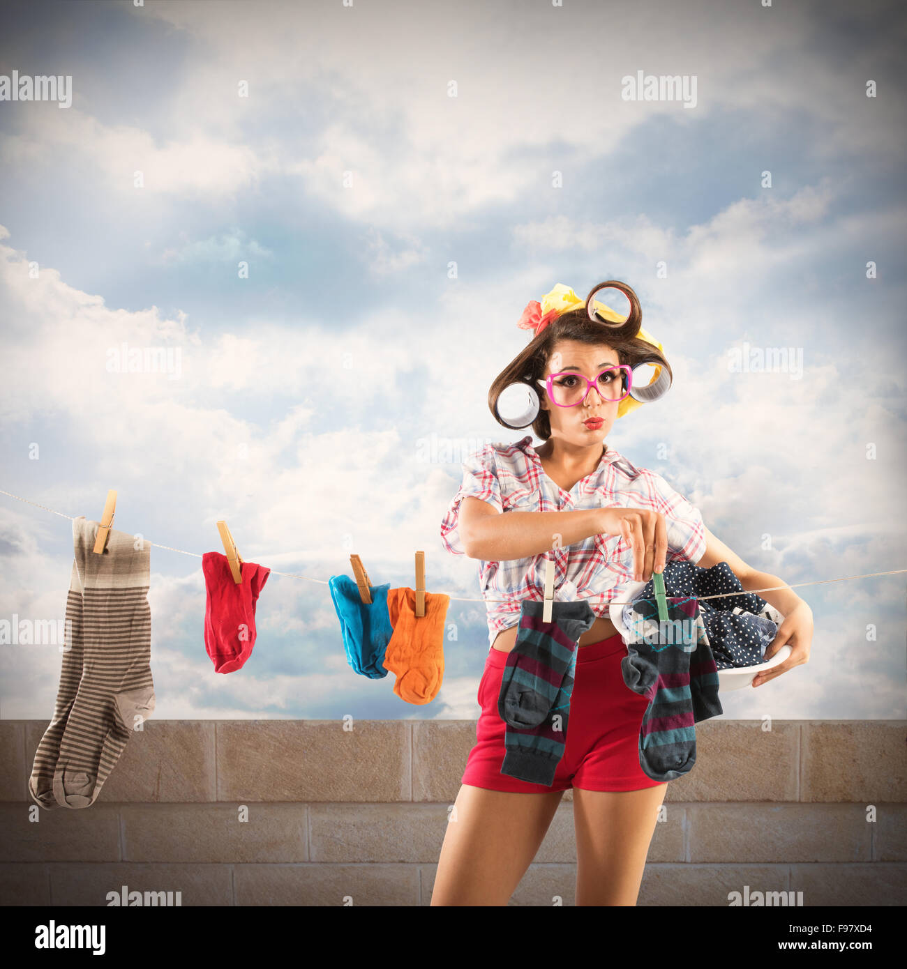 Woman drying clothing hi-res stock photography and images - Alamy