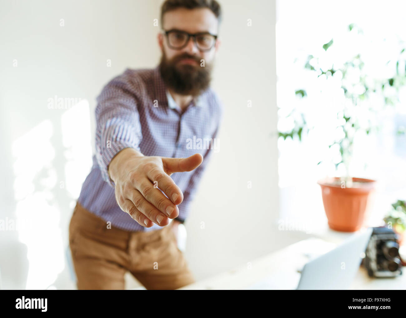 Man arm extended hand hi-res stock photography and images - Alamy