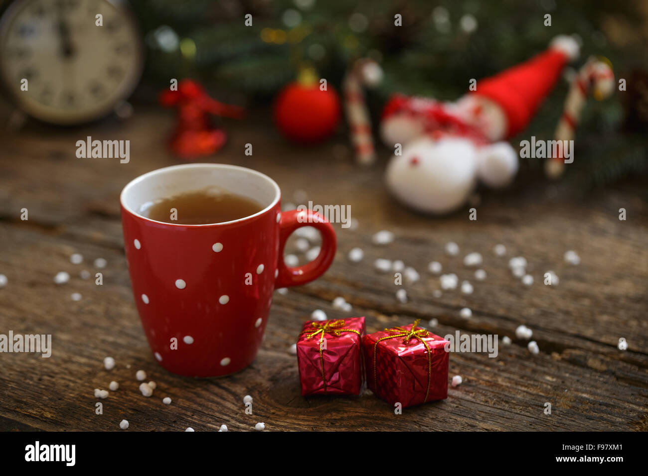Holidays, christmas, winter and drinks concept - close up of tea cup ...